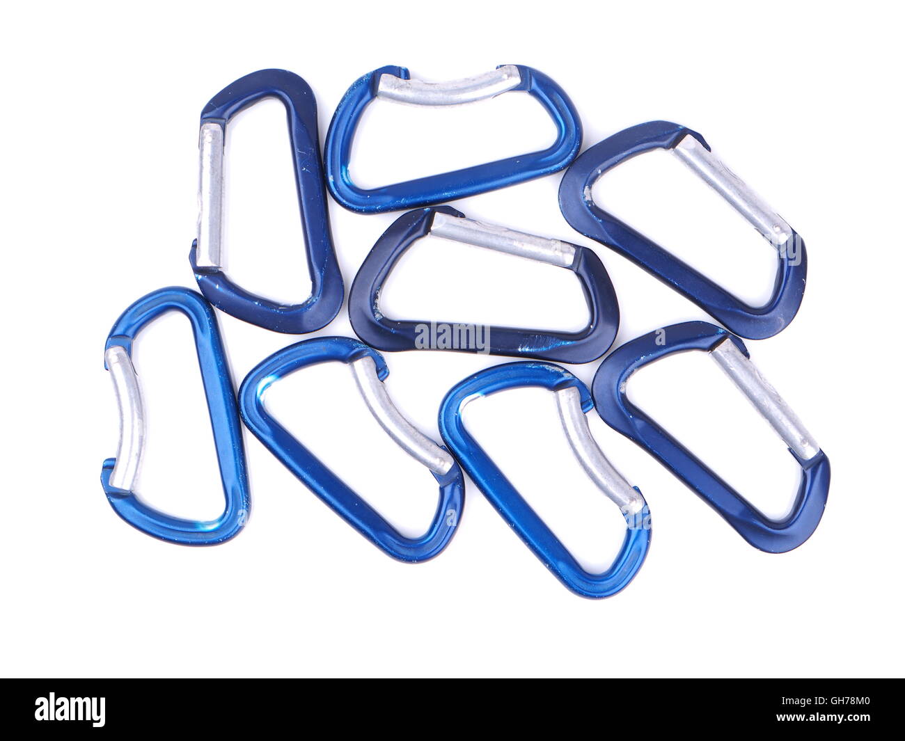blue climbing carabiners on a white background Stock Photo - Alamy