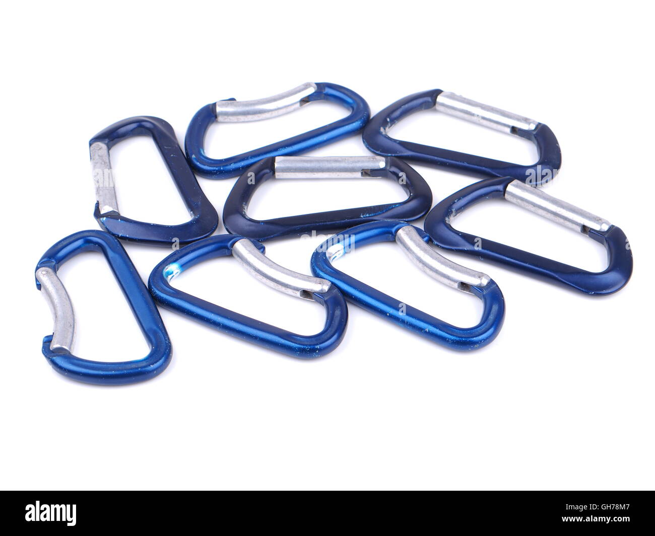 blue climbing carabiners on a white background Stock Photo - Alamy