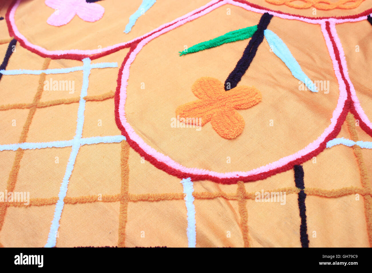 Traditional flower geometric patterns on bed cover Stock Photo - Alamy