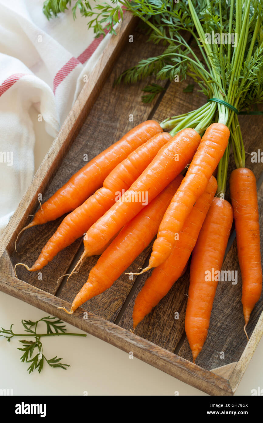raw carrot vegetable in wooden box Stock Photo - Alamy