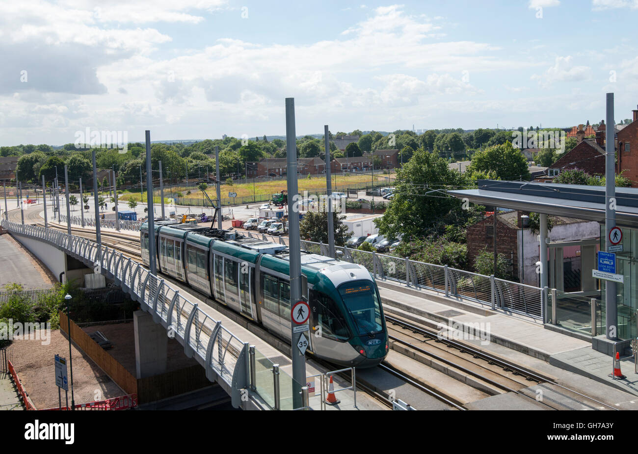 Tram coming in tram stop hi-res stock photography and images - Alamy