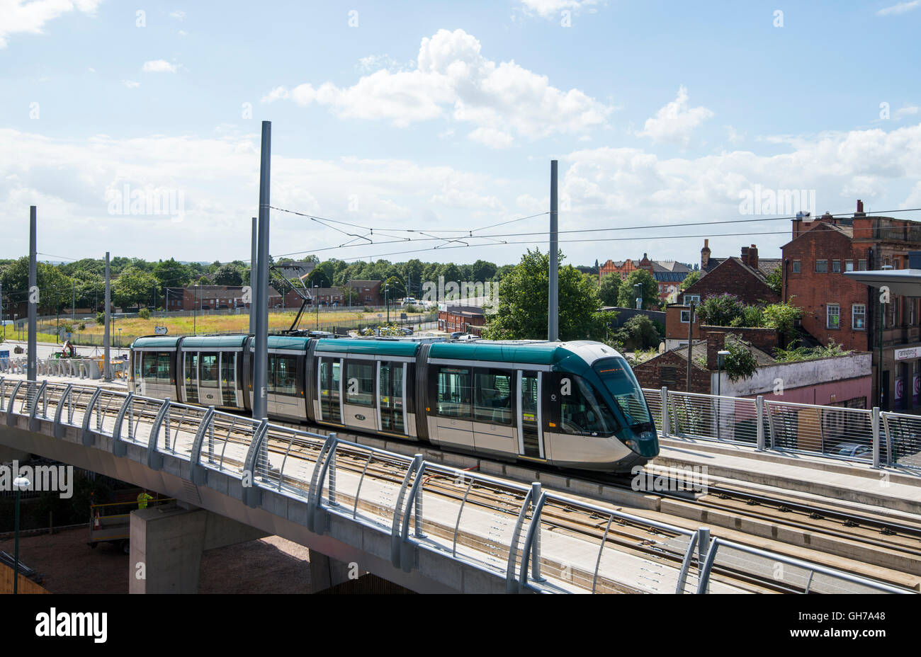 Tram coming into the stop at Nottingham Train Station in Nottingham ...