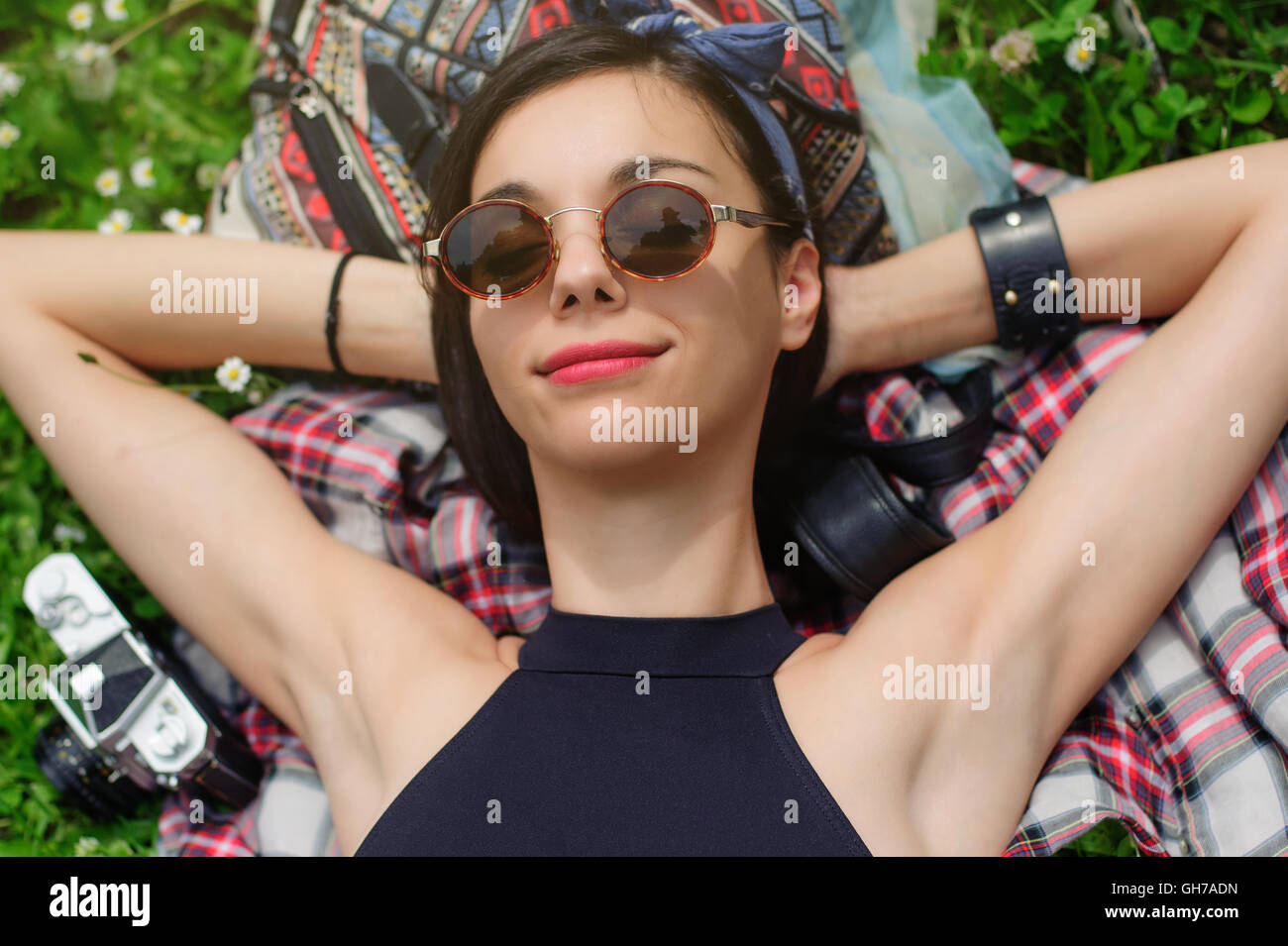 Girl resting in meadow Stock Photo - Alamy