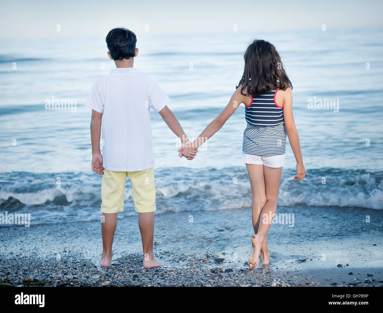 Boy and girl walking together hi-res stock photography and images - Alamy