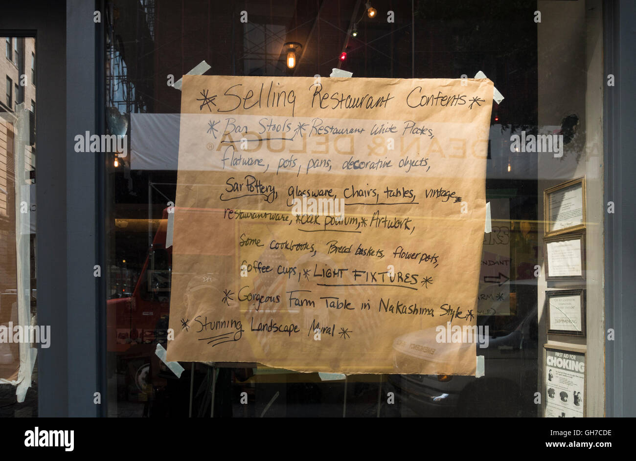 Hand-written notice of the sale of restaurant equipment Stock Photo - Alamy