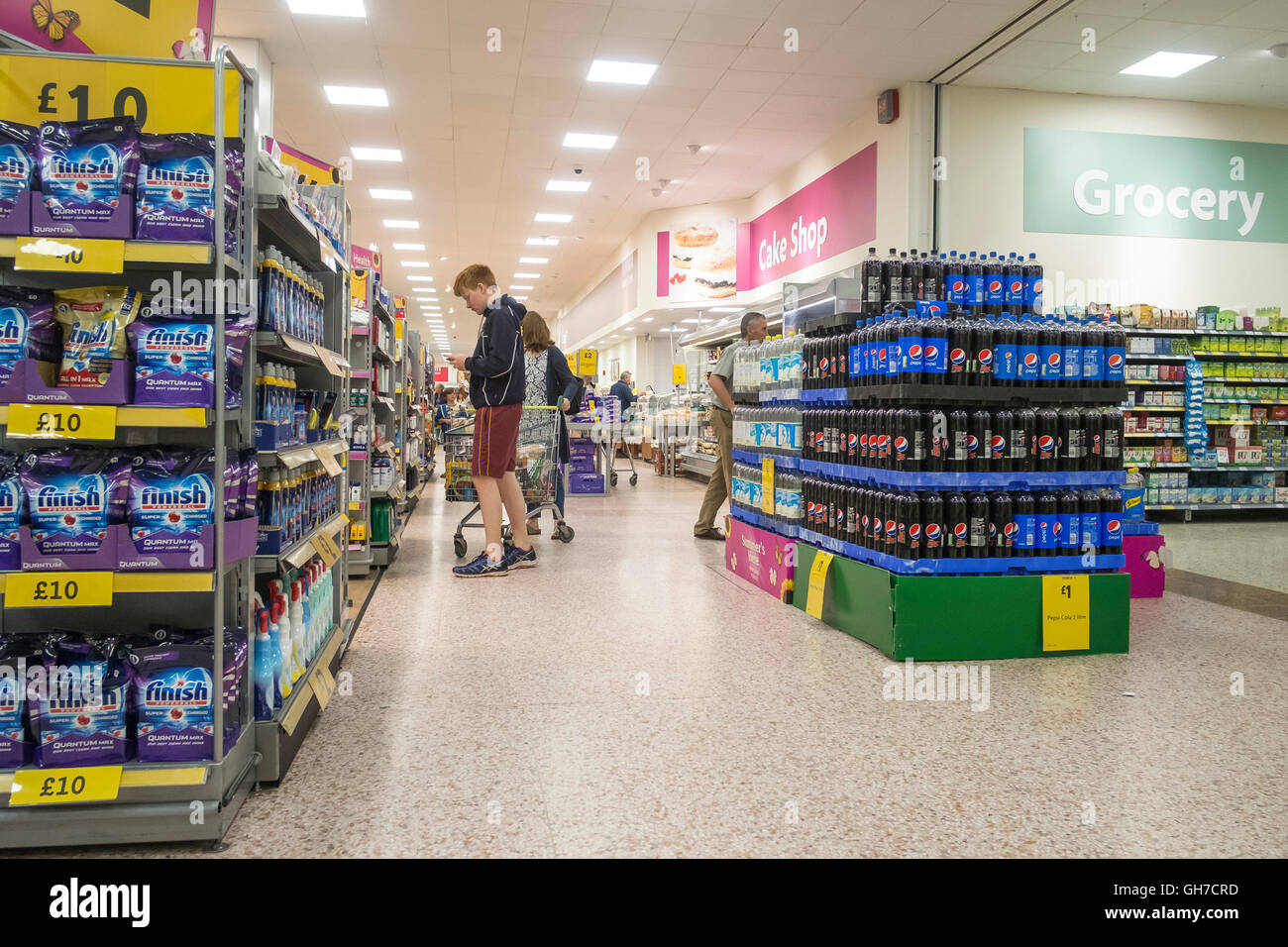 Customers shopping in a Morrisons supermarket Stock Photo - Alamy