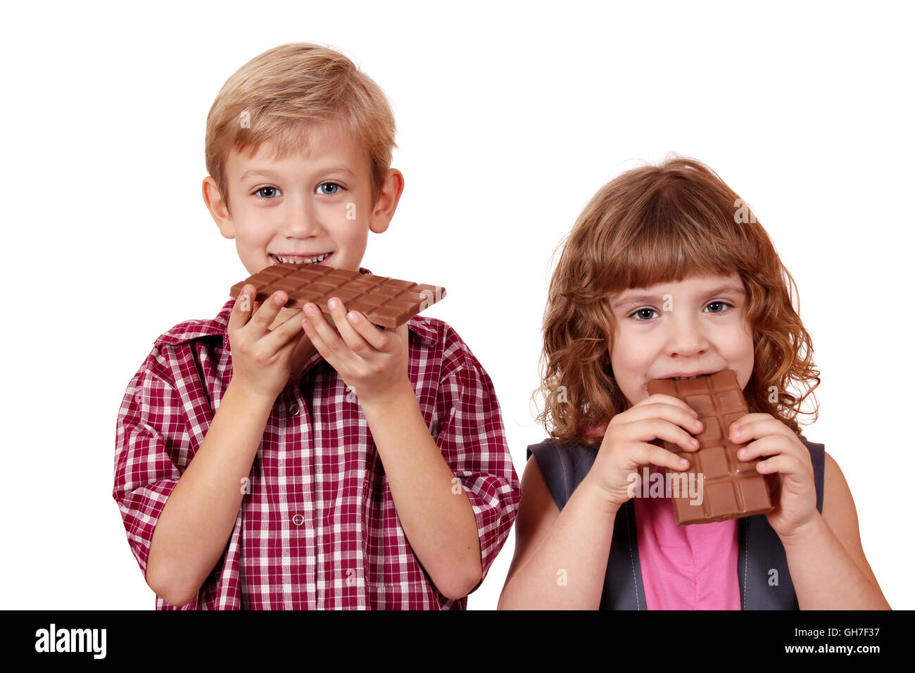 boy and little girl eating chocolate Stock Photo - Alamy