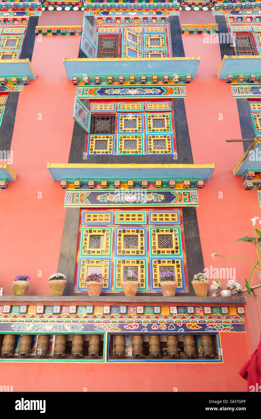 Colourful architectural detail of the windows of the Shechen monastery ...
