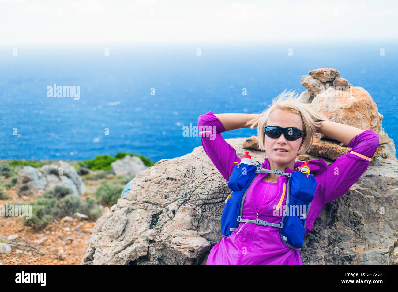 Trail running woman relaxing in mountains after run, healthy lifestyle ...