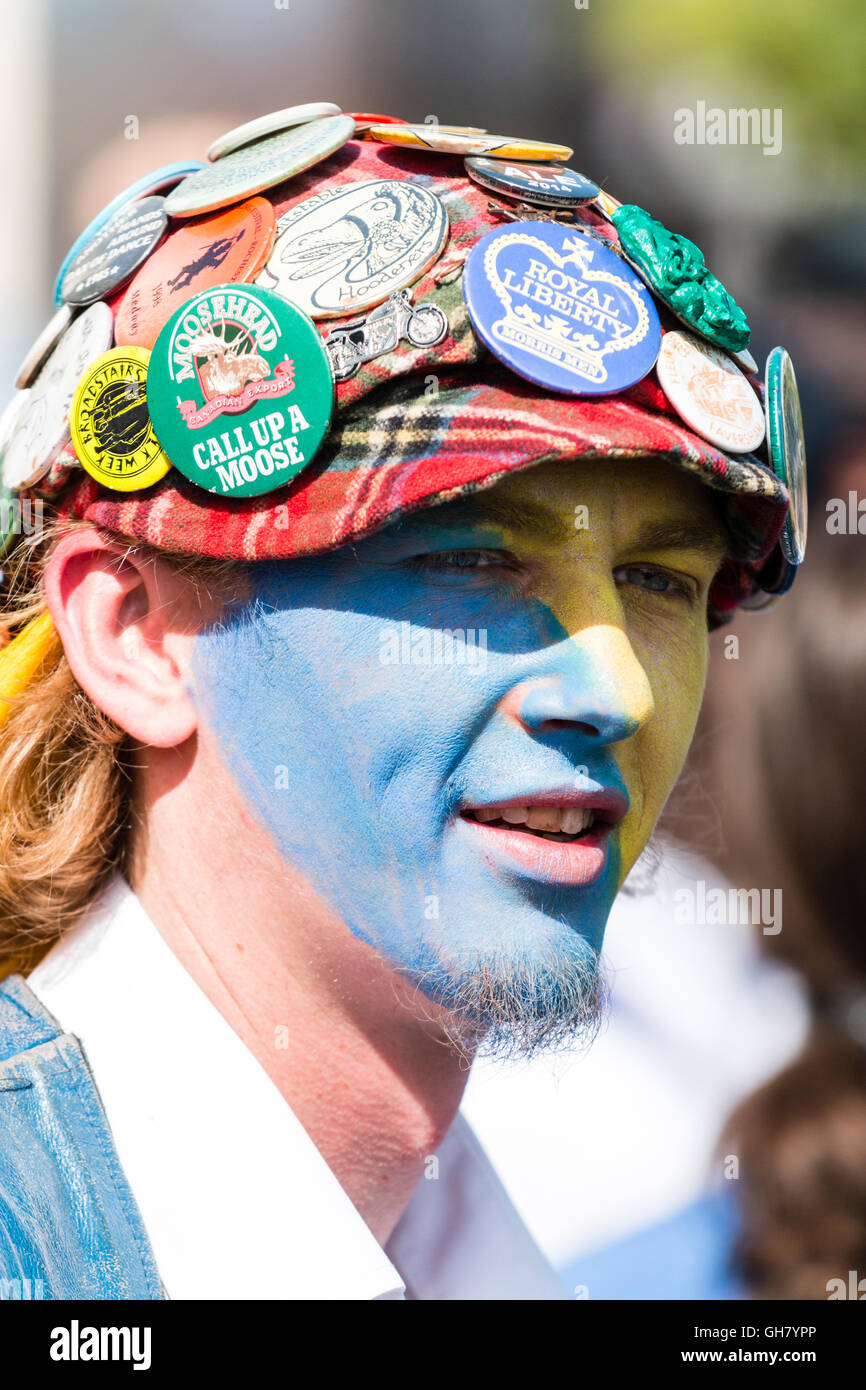 Close up of Royal Liberty Morris dancer, young man, with face painted ...