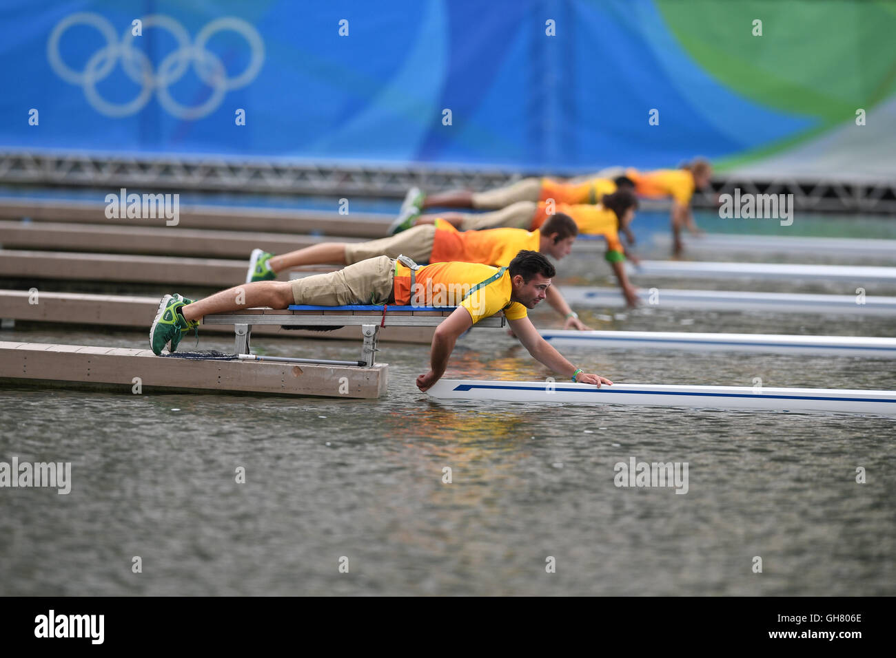 Rio de Janeiro, Brazil. 8th Aug, 2016. Volunteers fix the boats during ...