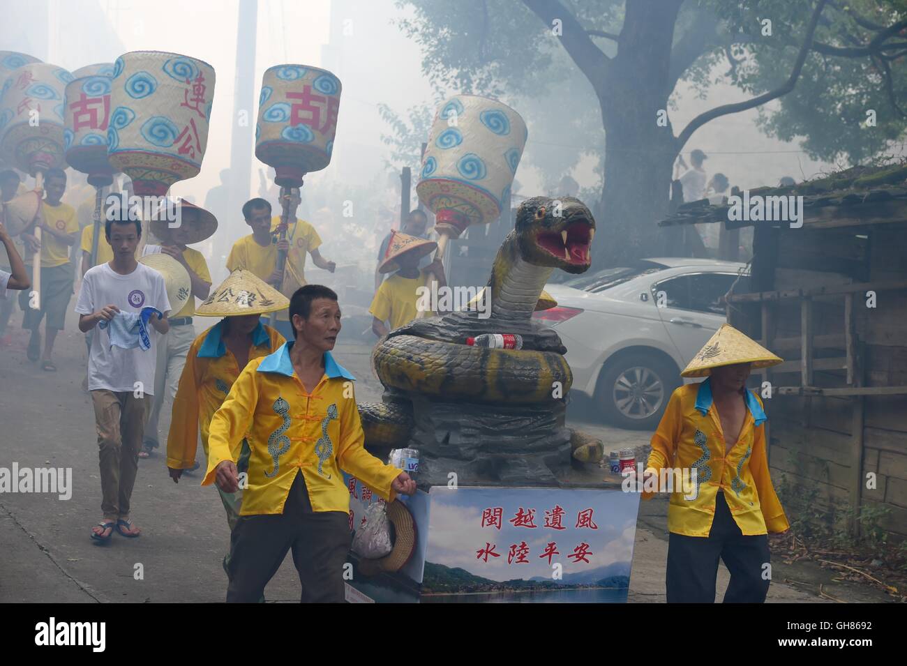Nanping, China's Fujian Province. 9th Aug, 2016. People parade during ...