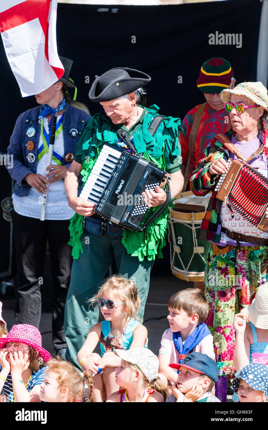 Broadstairs folk week festival. Three morris men musicians playing ...