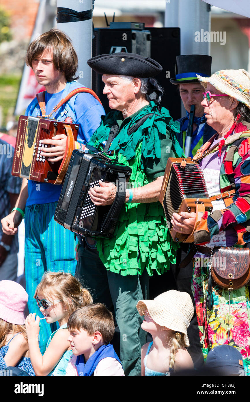 Broadstairs folk week festival. Three morris men musicians playing ...