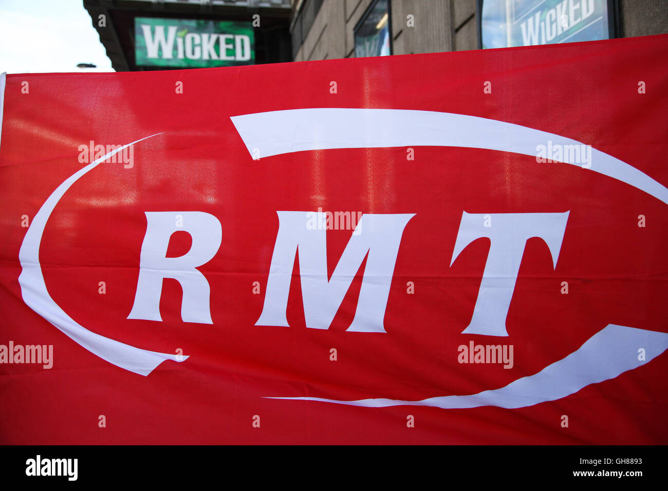 London, UK. 9 August 2016. RMT flag. Members of the RMT union on picket ...