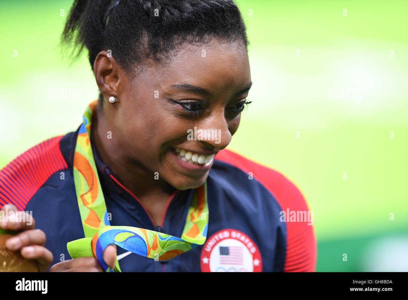 Gold medalist Simone Biles of the USA takes part in the medal ceremony ...