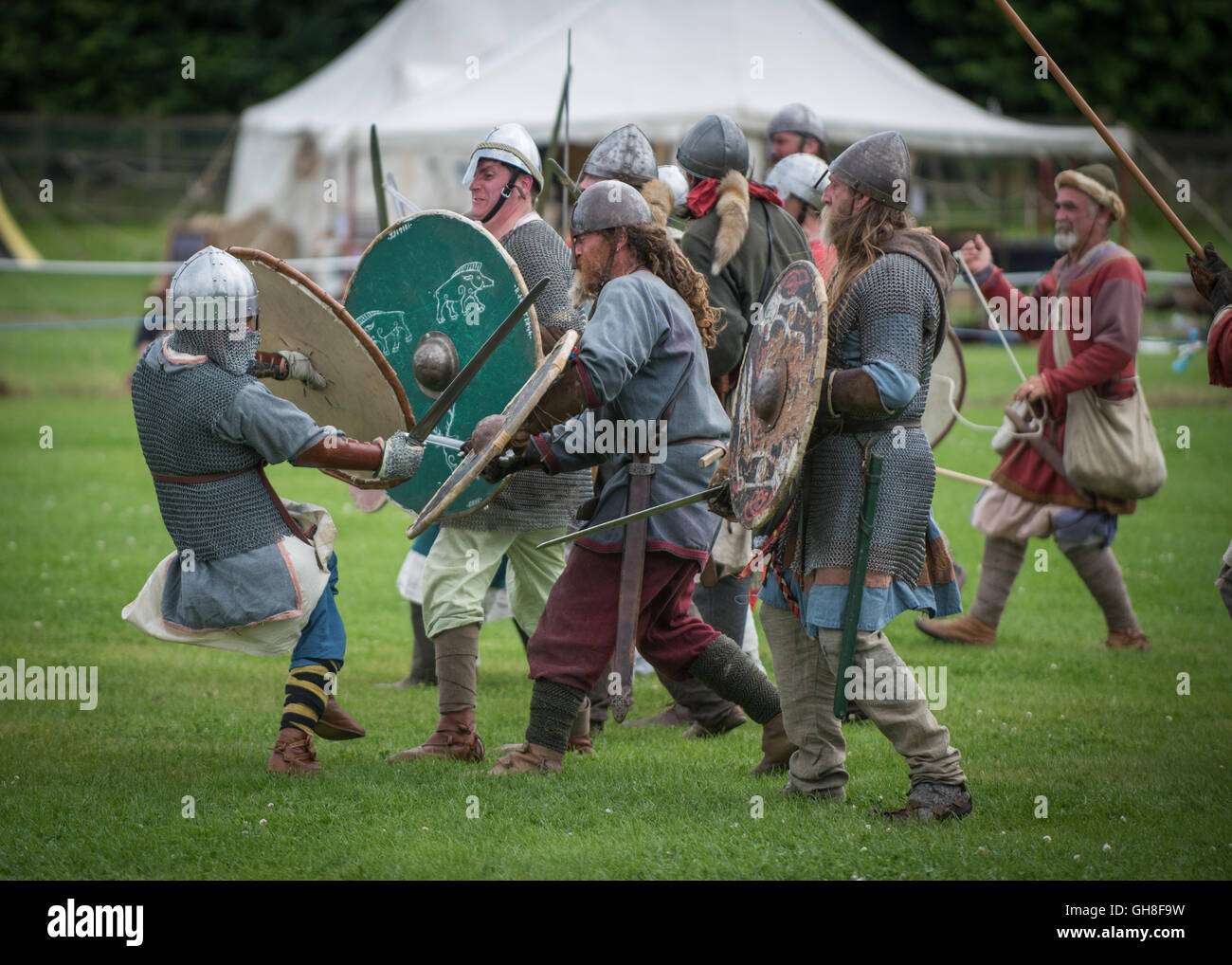 Viking battle re-enactment. repelled shield bash Stock Photo - Alamy
