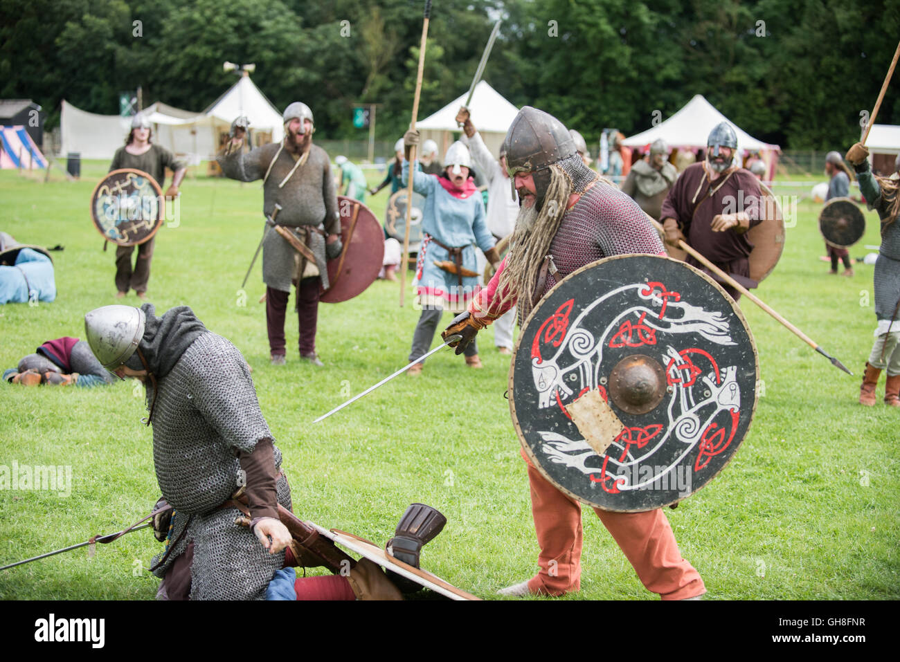Viking battle re-enactment. Killing opponent Stock Photo - Alamy