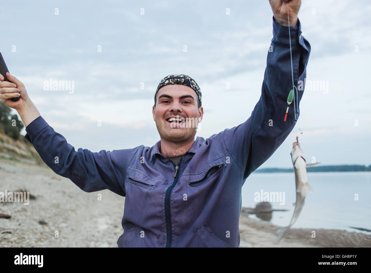 The fisherman has hooked fish. Fresh-caught bream Stock Photo - Alamy