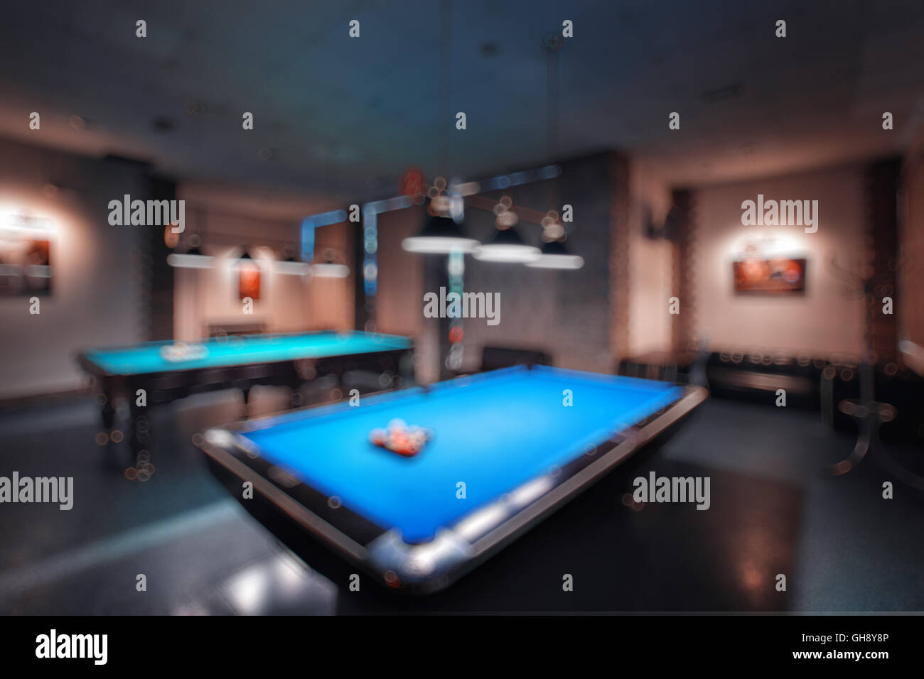 abstract blur. brand new and modern billiard interior in night time ...