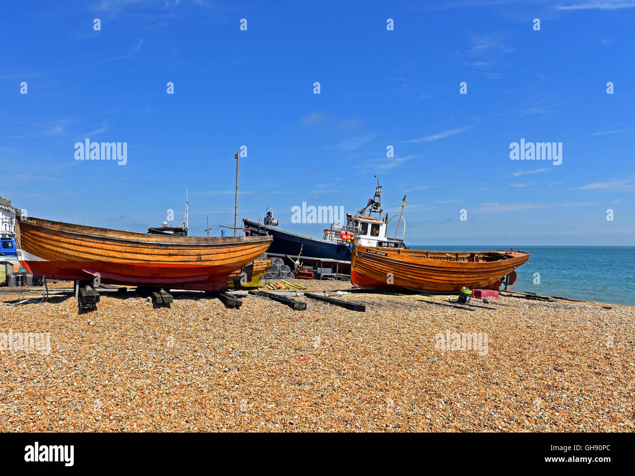 Fishing boats moored up on the shingle beach at Deal, on the English ...