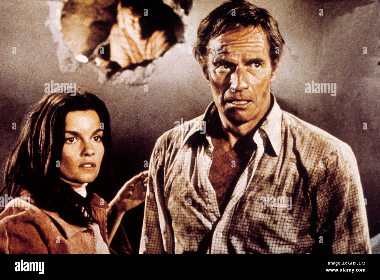 GENEVIEVE BUJOLD (Denise Marshall), CHARLTON HESTON (Stewart Graff ...