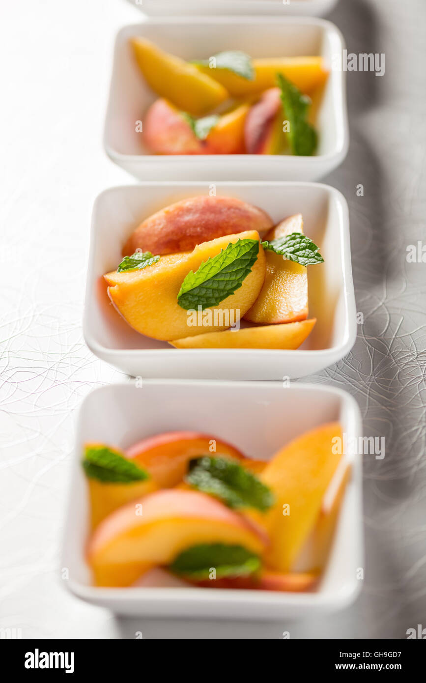 Peach slice hi-res stock photography and images - Alamy