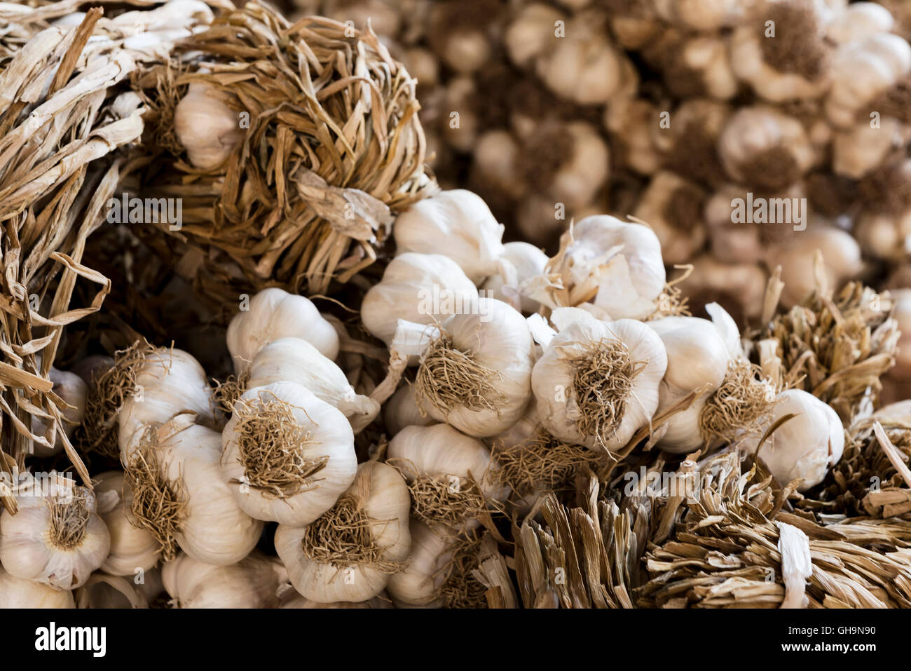 Strings of garlic Stock Photo - Alamy