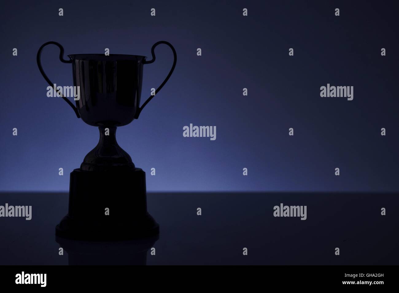 A studio photo of a vintage trophy Stock Photo - Alamy