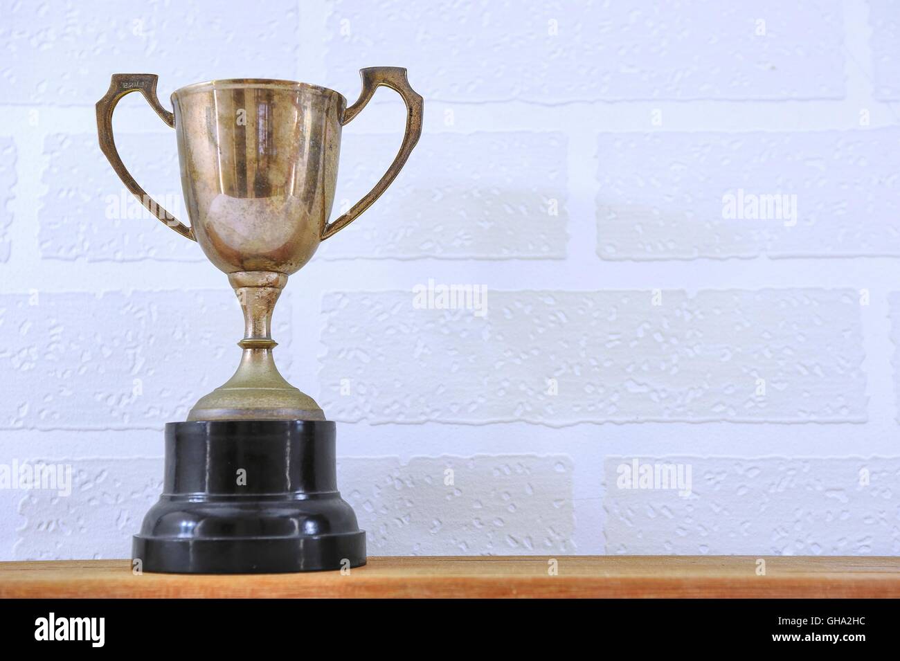 A studio photo of a vintage trophy Stock Photo - Alamy