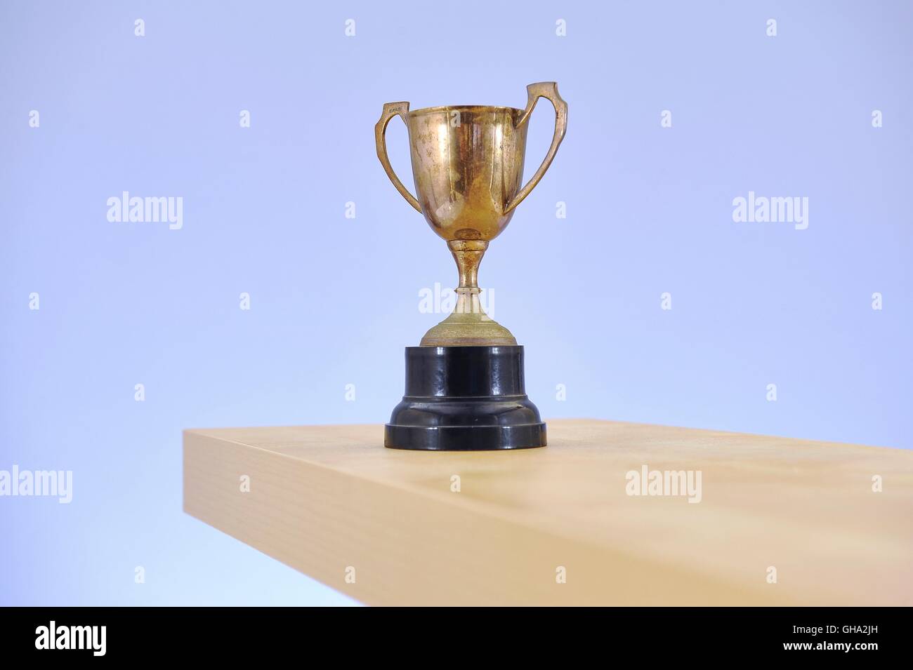 A studio photo of a vintage trophy Stock Photo - Alamy