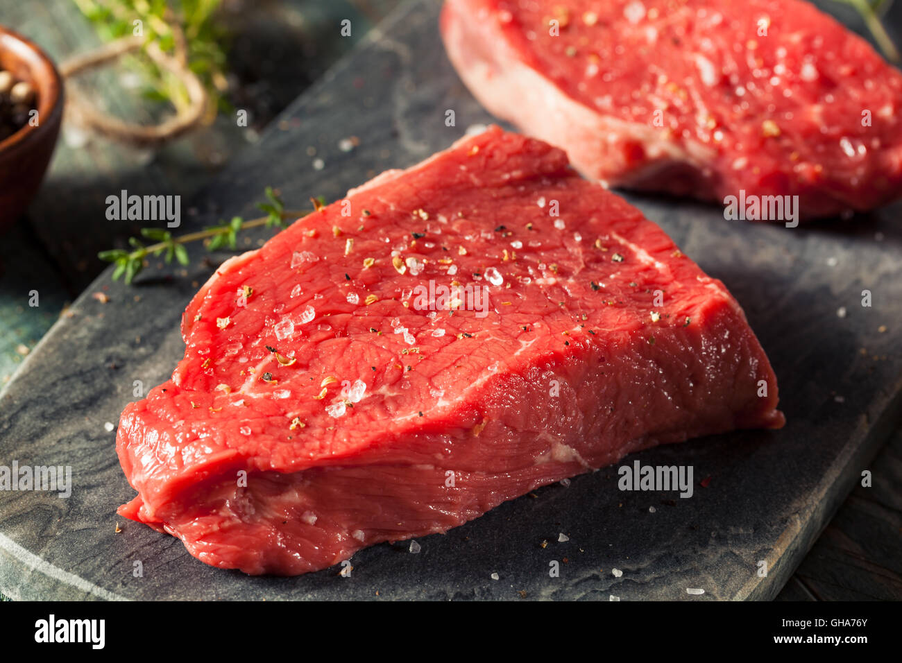 Raw Organic Grass Fed Sirloin Steak with Salt and Pepper Stock Photo ...