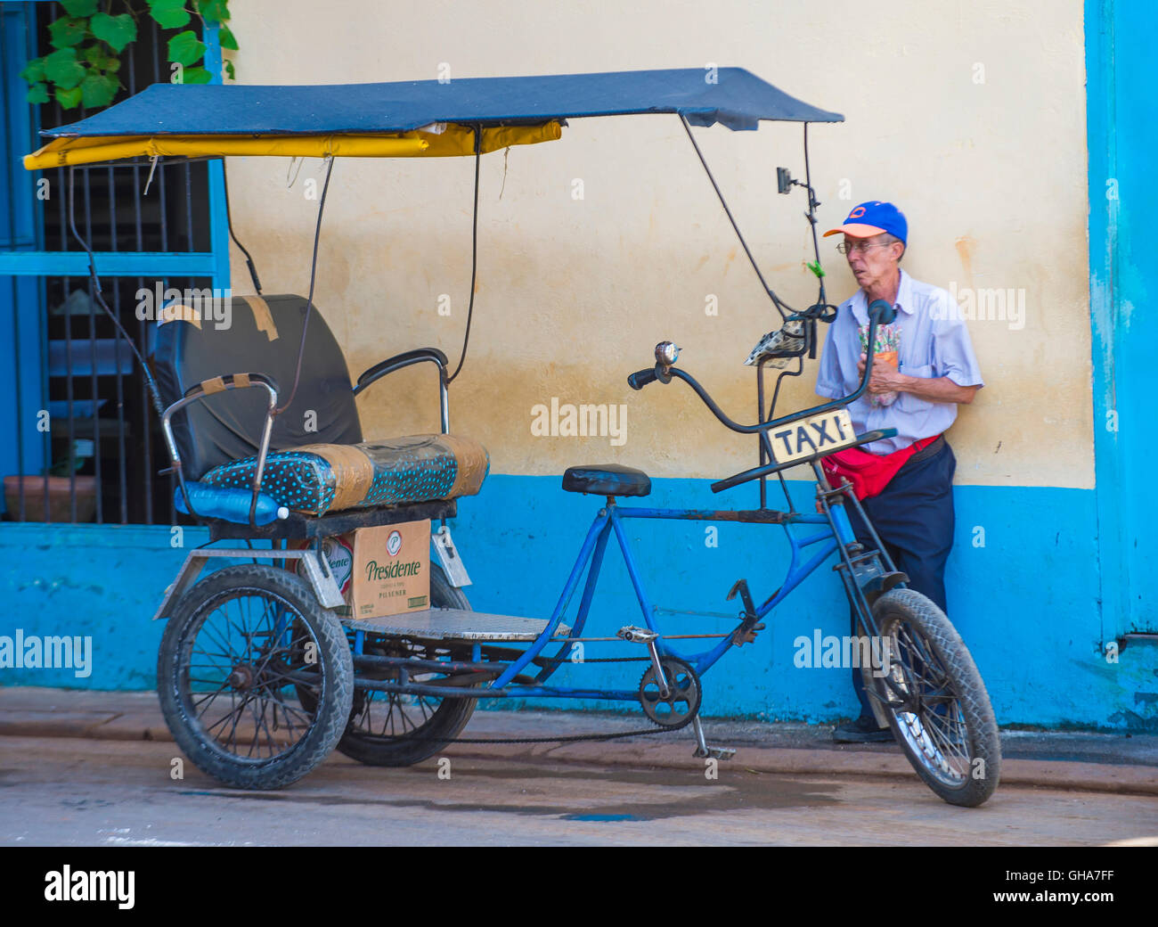 A Cuban rickshaw driver in old Havana street Stock Photo - Alamy
