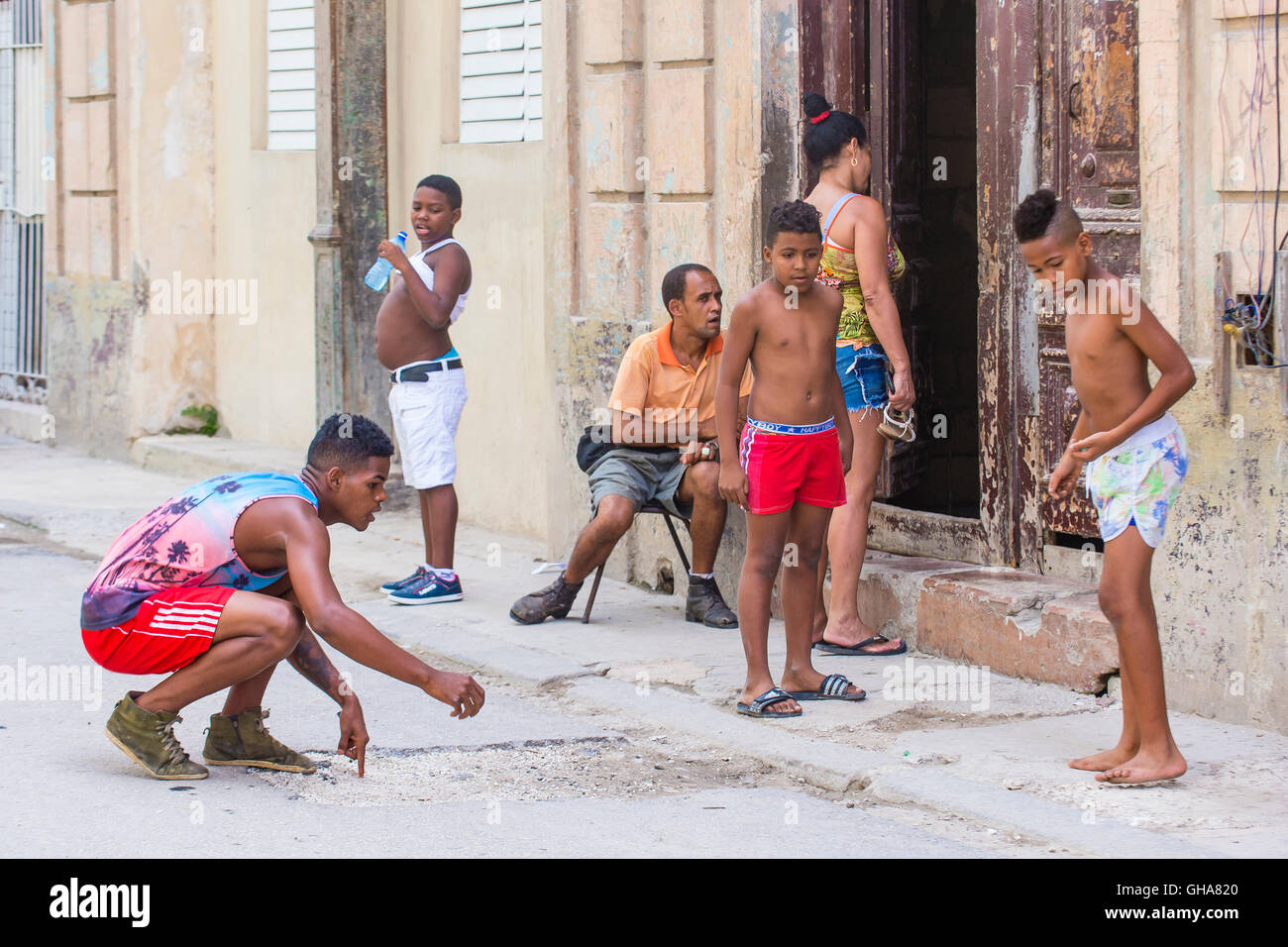 HAVANA, CUBA - JULY 18 : Cuban children playing in old Havana street on ...