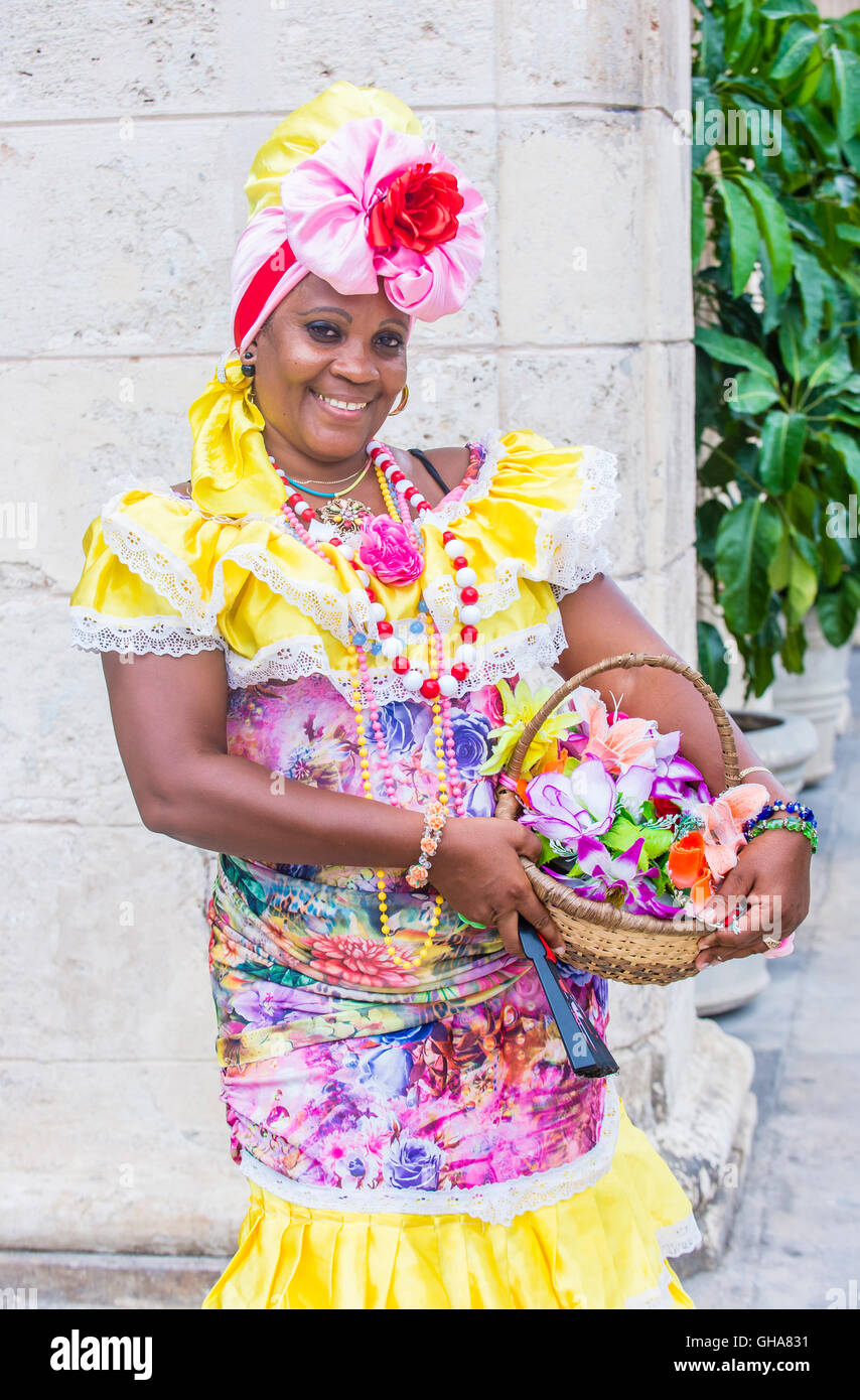 Cuban woman with traditional clothing in old Havana Stock Photo - Alamy