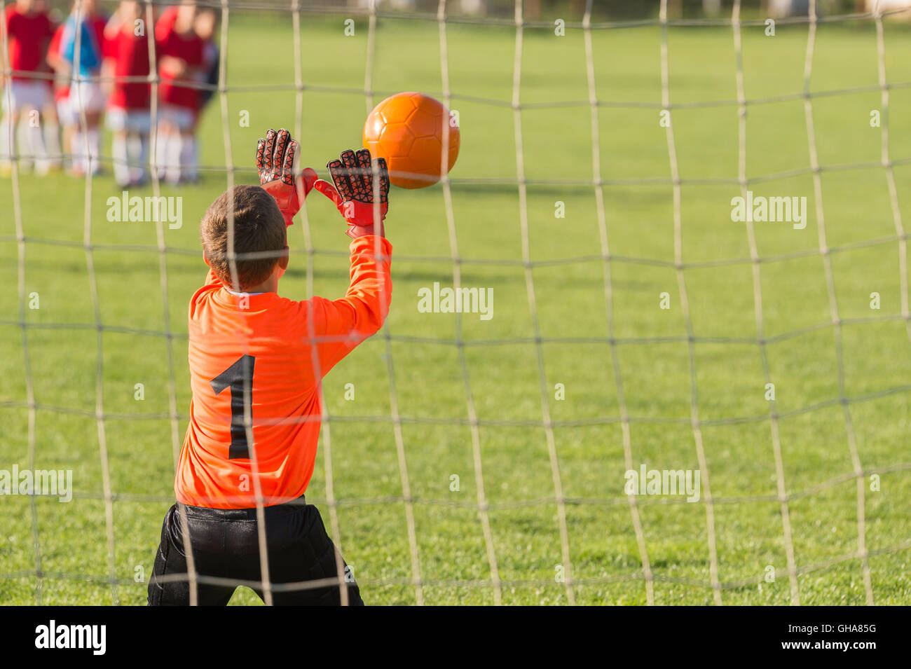 Soccer goalkeeper block soccer player hi-res stock photography and ...
