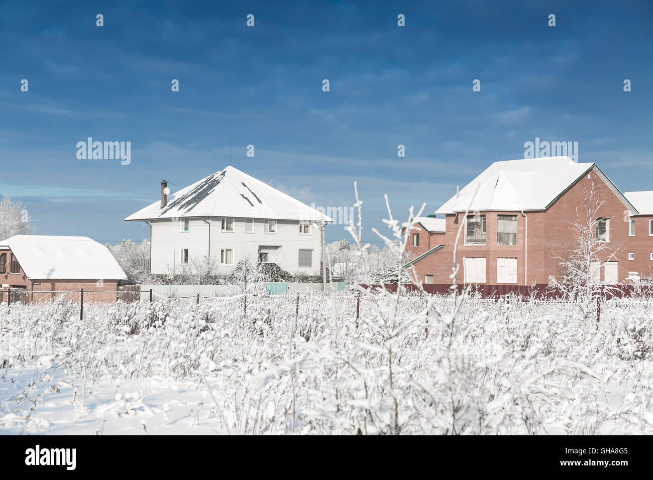 Country houses after snowfall Stock Photo - Alamy