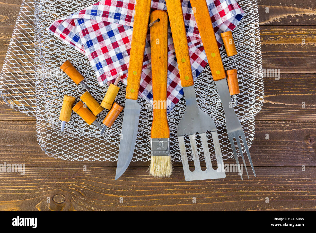 Stainless steel barbecue cooking set with wood handles Stock Photo - Alamy