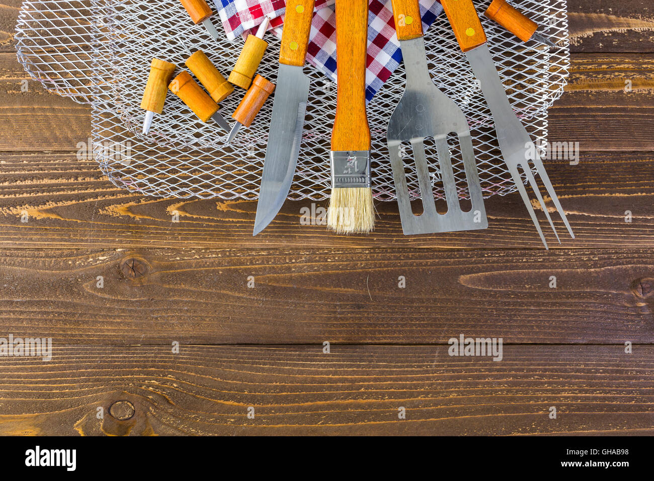 Stainless steel barbecue cooking set with wood handles Stock Photo - Alamy