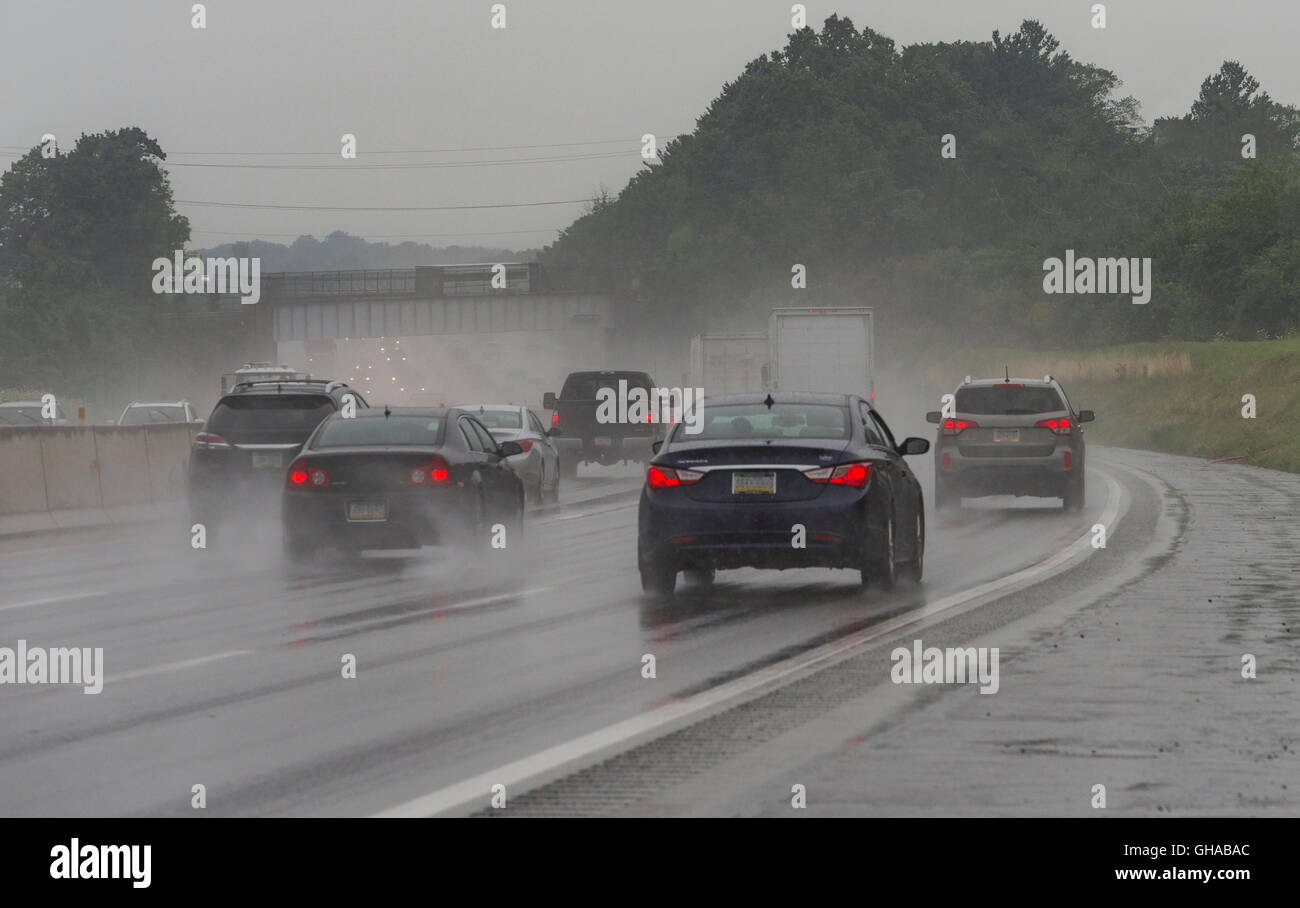 Highway Traffic In Rain Storm Stock Photo - Alamy