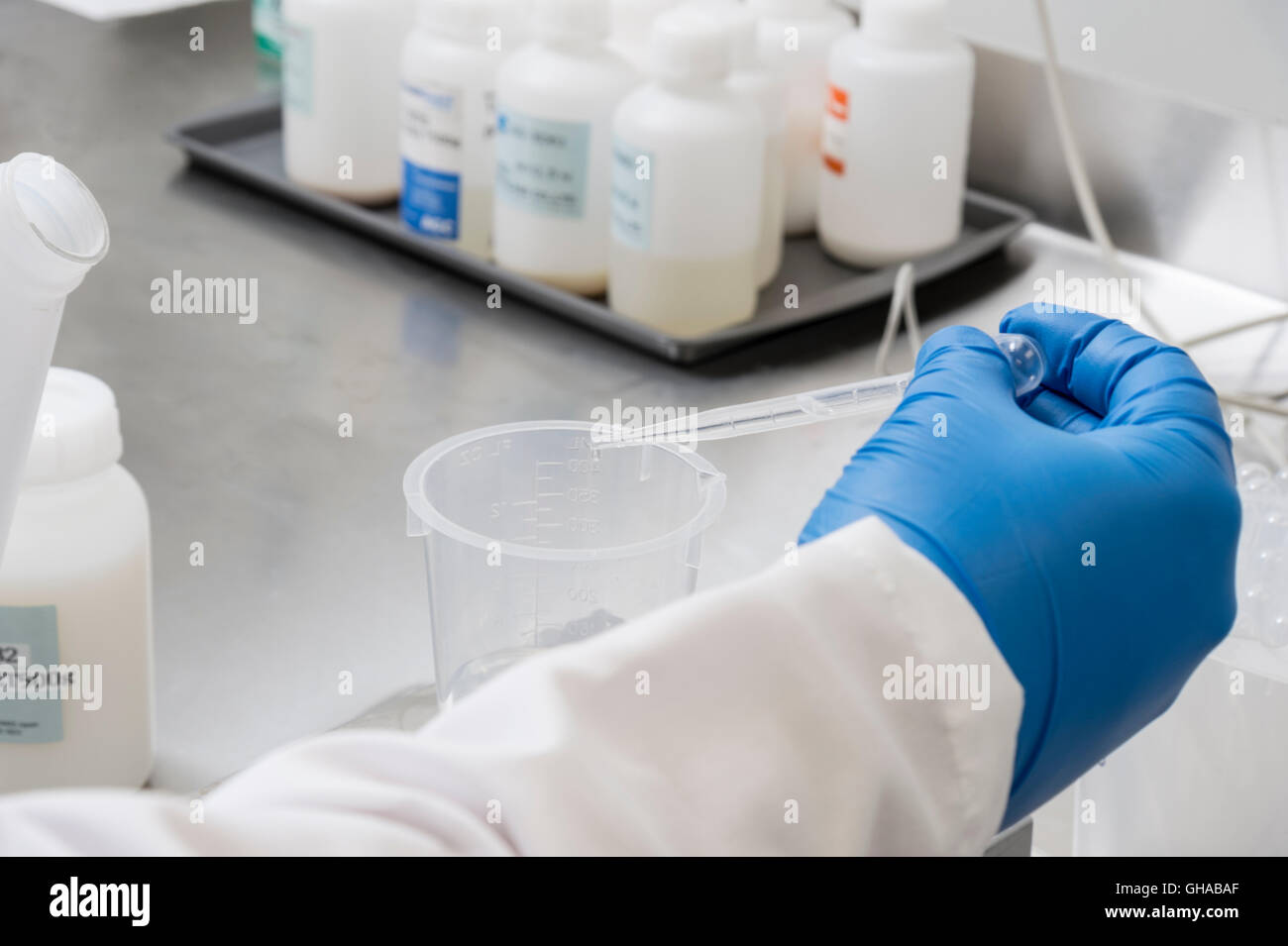 Lab technicians hands in gloves hi-res stock photography and images - Alamy