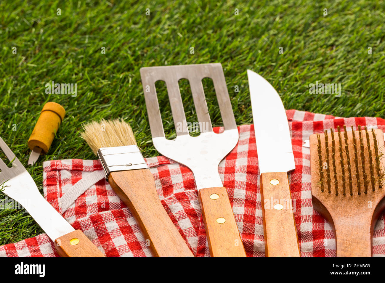 Stainless steel barbecue cooking set with wood handles Stock Photo - Alamy