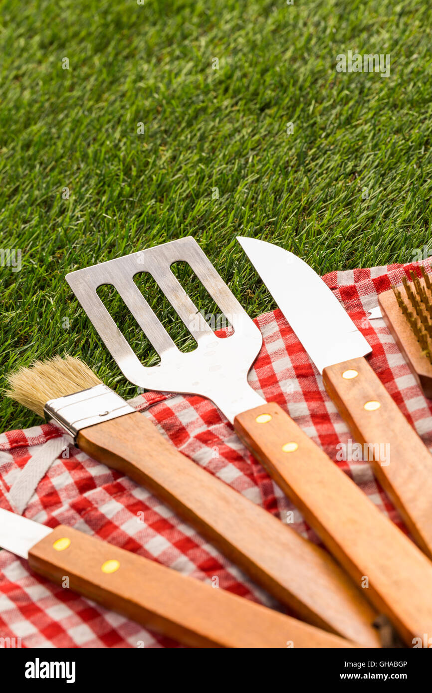 Stainless steel barbecue cooking set with wood handles Stock Photo - Alamy