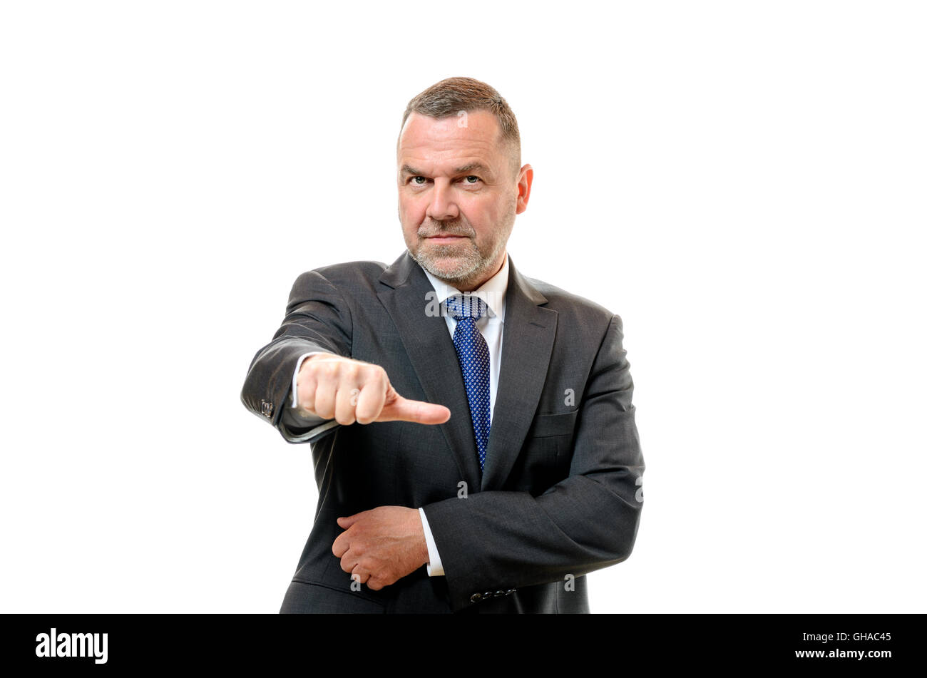 Stern businessman indicating his neutrality with a hand gesture as he ...