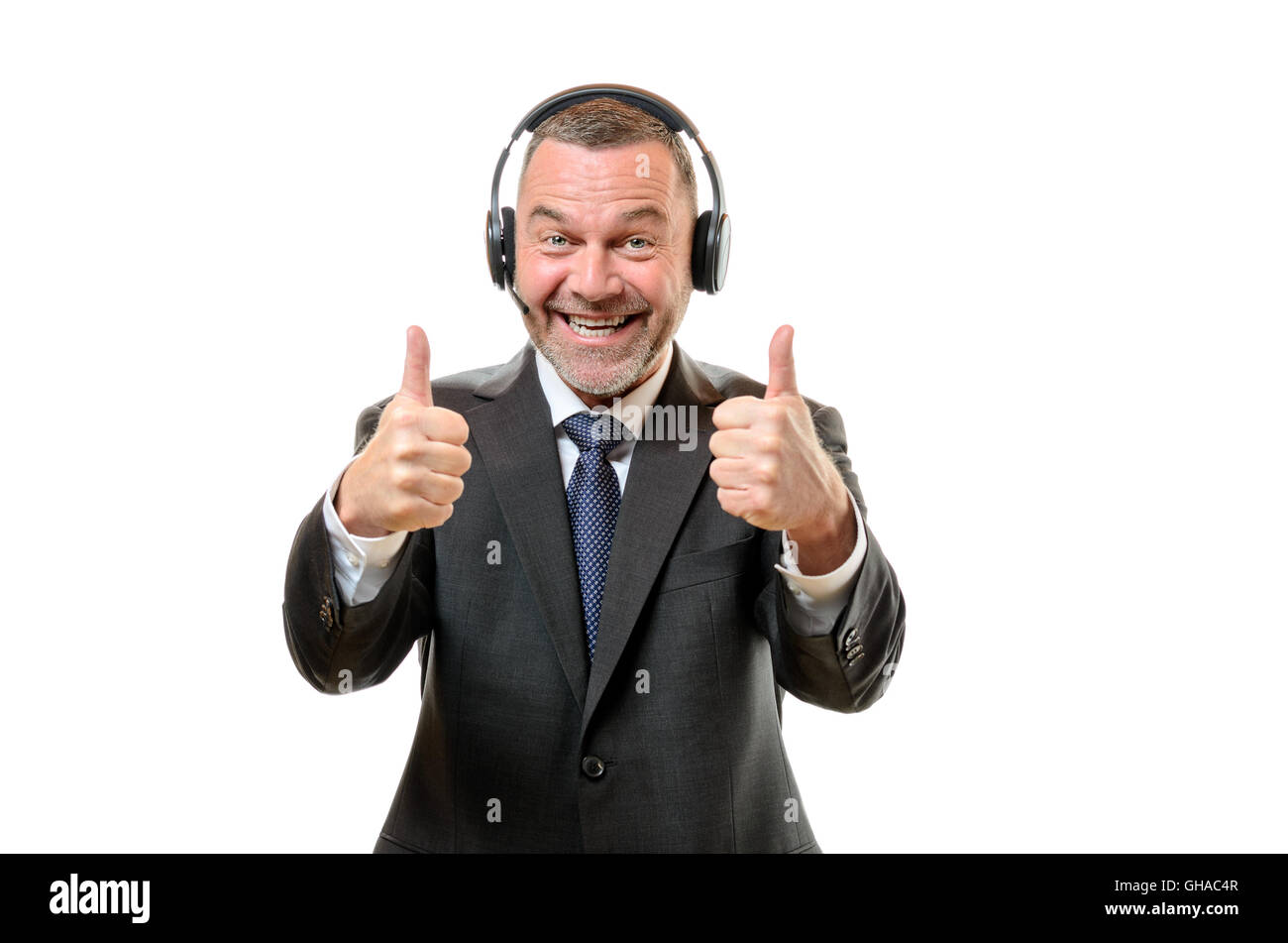 Happy newscaster with two thumbs up and big smile wearing a business ...