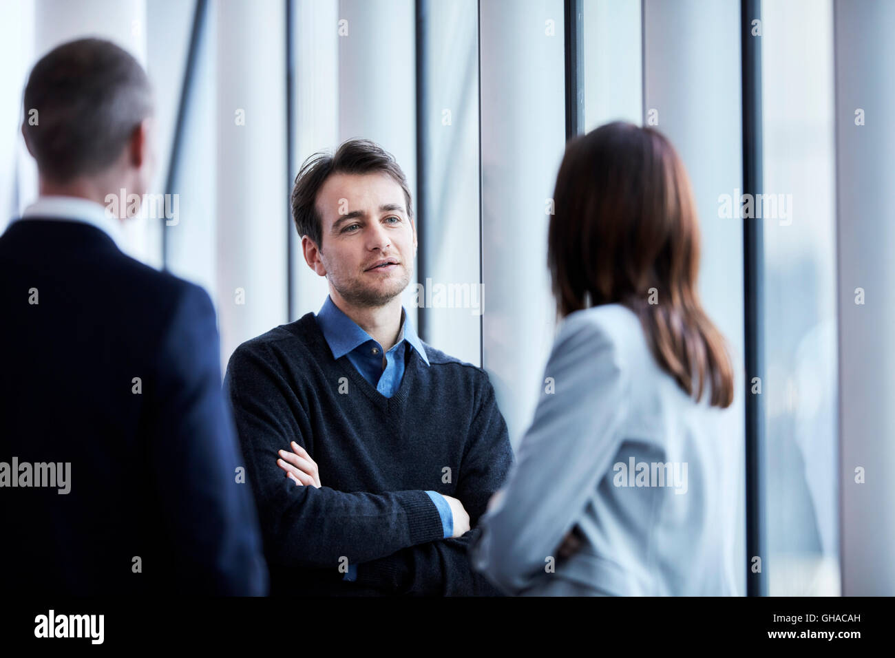 Business people talking Stock Photo - Alamy