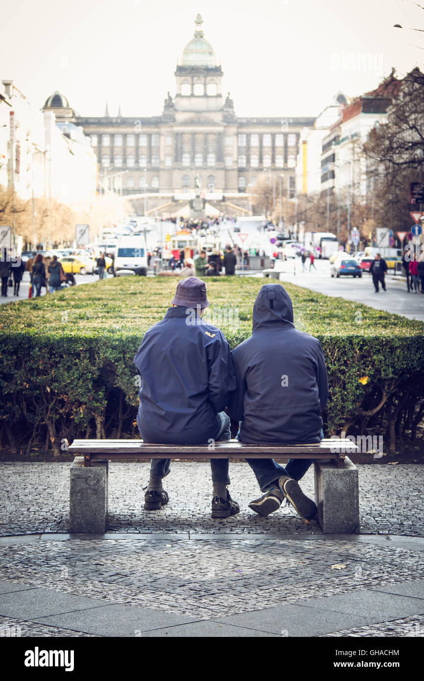 Two men sitting on a bench hi-res stock photography and images - Alamy