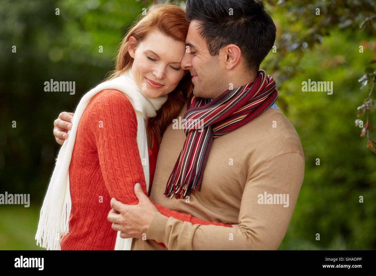 Happy couple walking together Stock Photo - Alamy