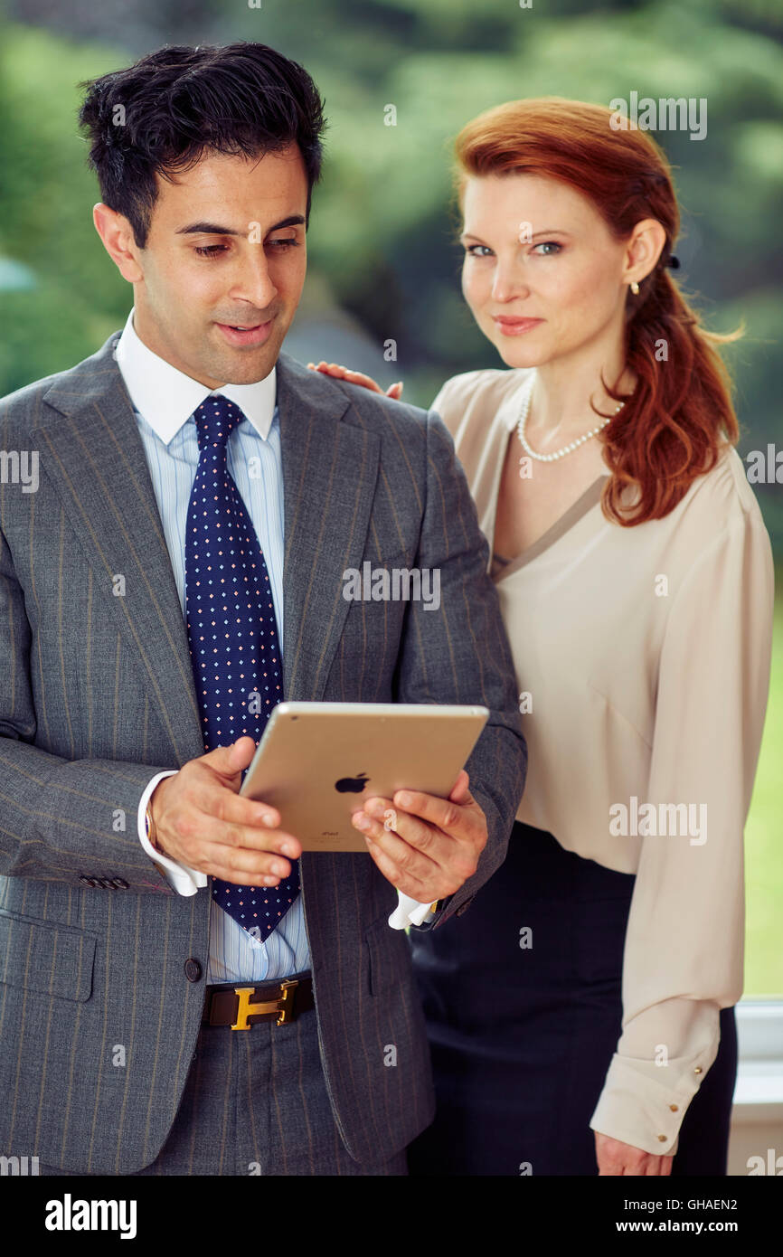 Two business people discussing work Stock Photo - Alamy Two business people discussing work Stock Photo - Alamy