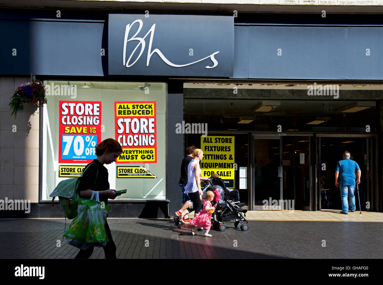 People walking past branch of BHS, British Home Stores, holding closing ...